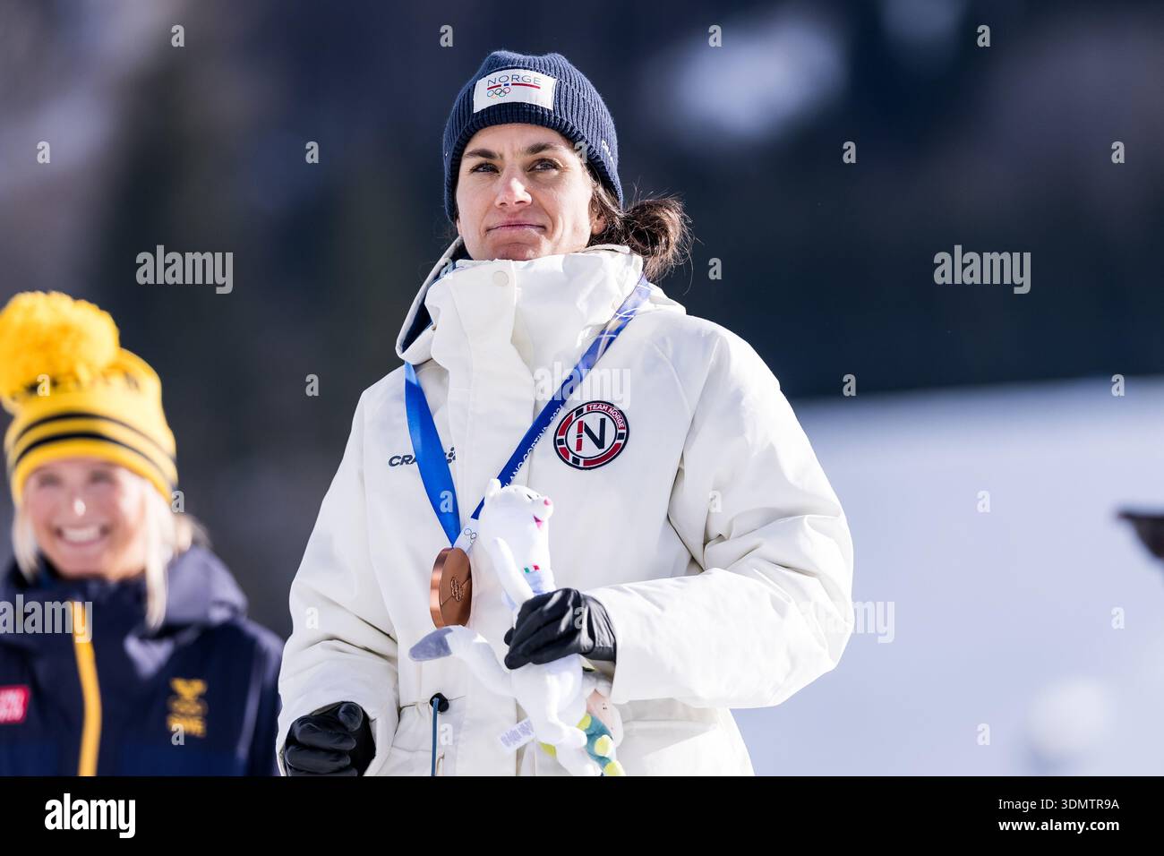 TESERO, ITALY - FEBRUARY 7: Heidi Weng (Norway) with the bronze medal ...