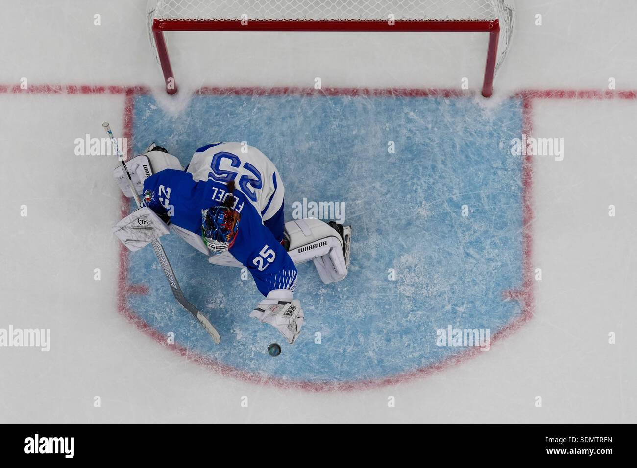 Italy's goaltender Martina Fedel (25) makes a save in the first period ...