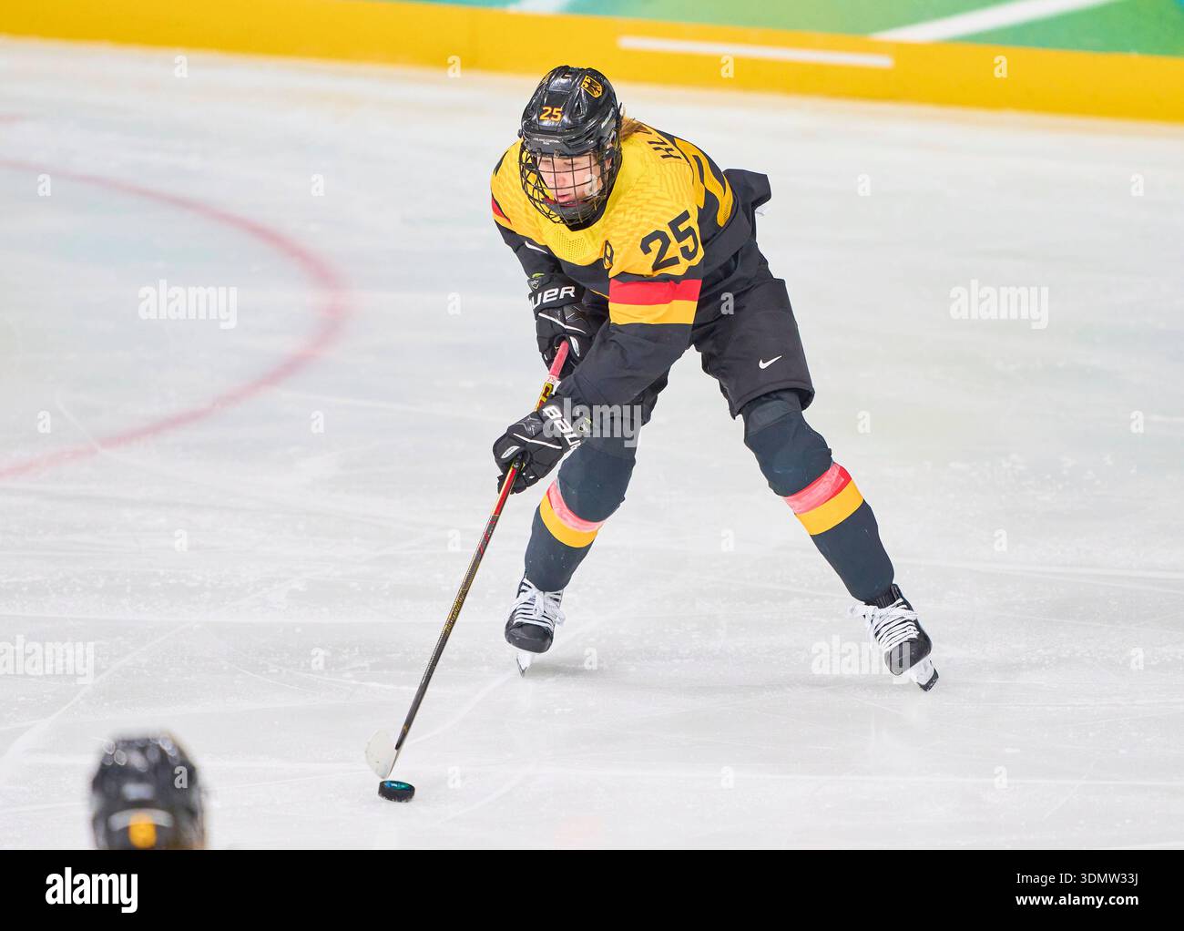 Laura Kluge of Germany controls the puck at the preliminary women Ice ...