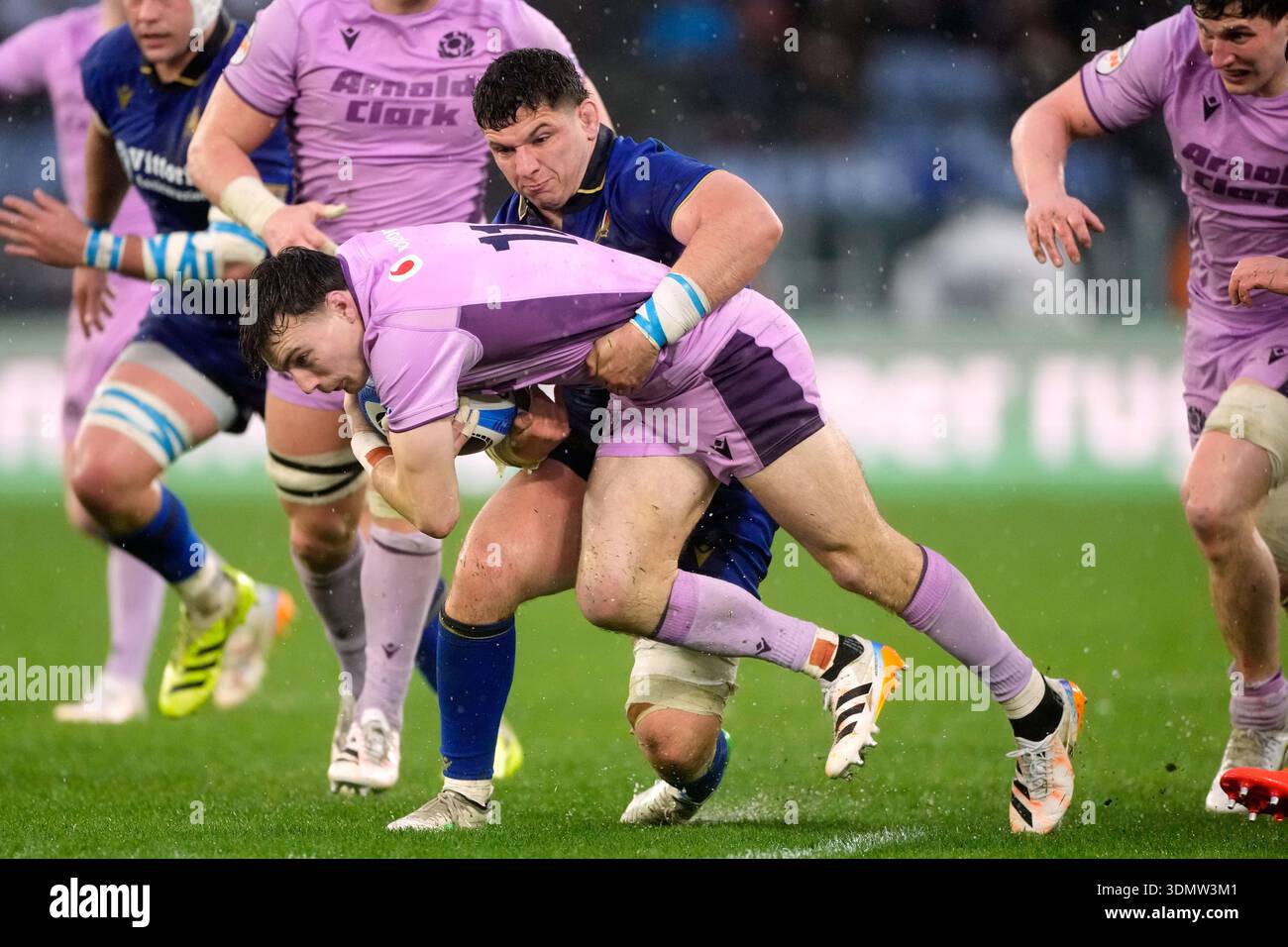 Scotland's Jamie Dobie, left, and Italy's Giacomo Nicotera in action ...
