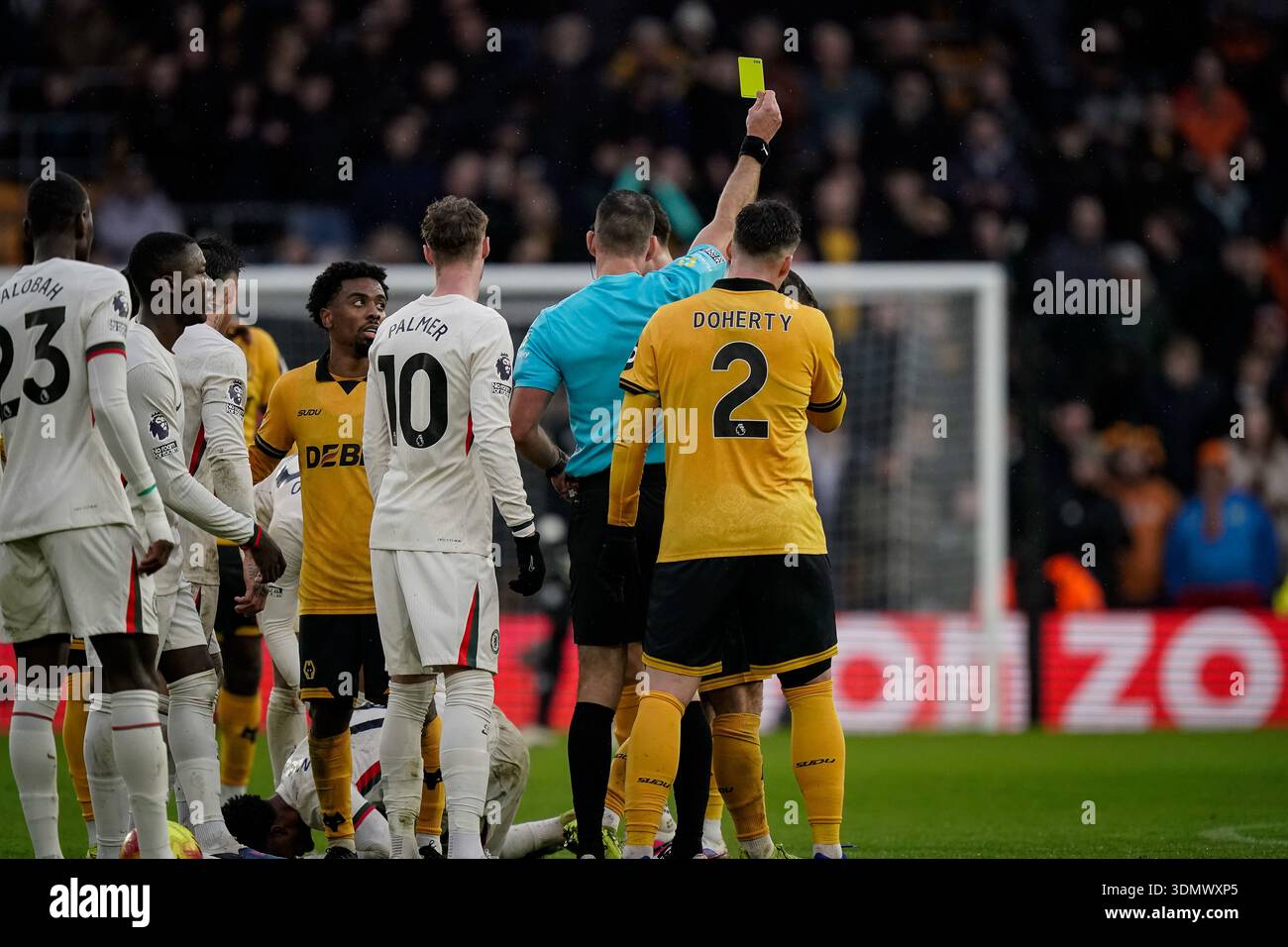 Referee Jarred Gillet gives a yellow card to Adam Armstrong of ...