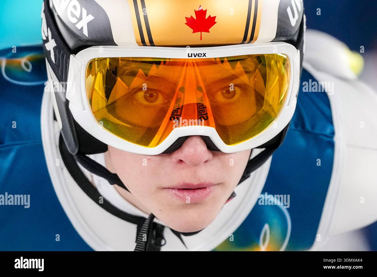Nicole Maurer, of Canada, goes down the ramp during her trial jump of ...