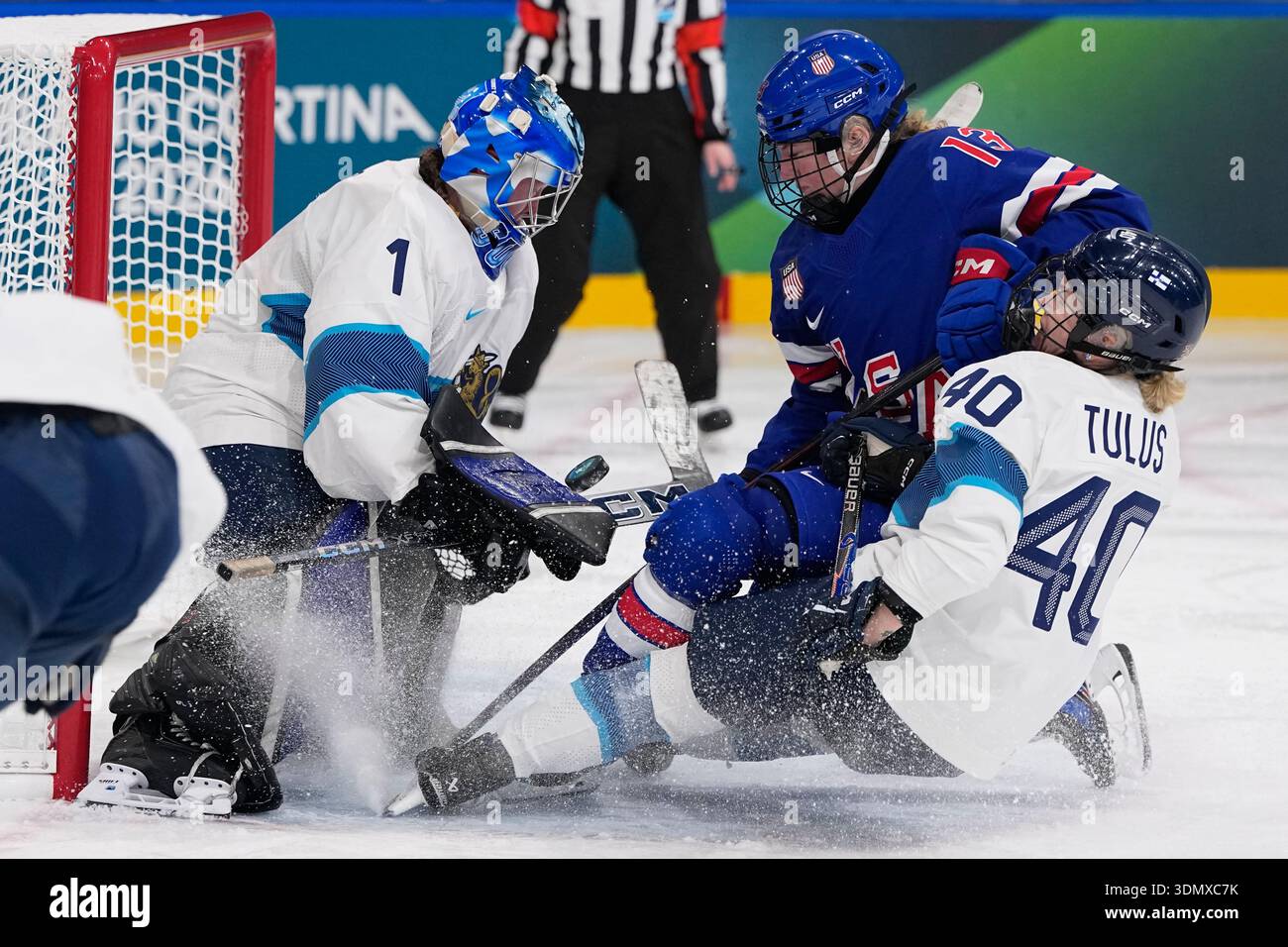 Finland's Sanni Ahola and Finland's Noora Tulus, right, make a save ...