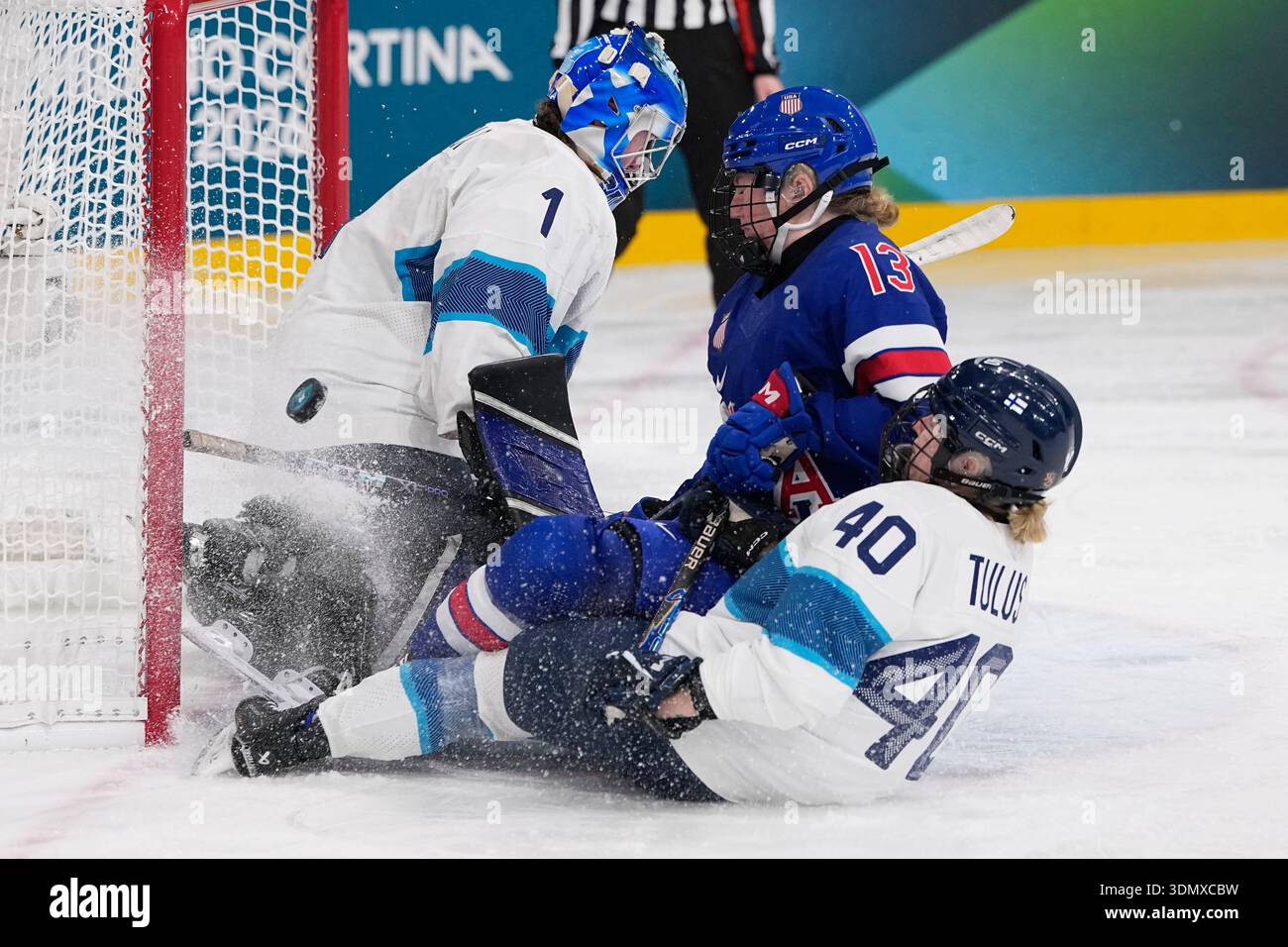 Finland's Sanni Ahola and Finland's Noora Tulus, right, make a save ...