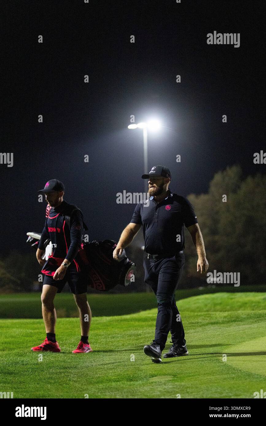 Tyrrell Hatton of Legion XIII and caddie, Hugo Dobson, on the sixth ...