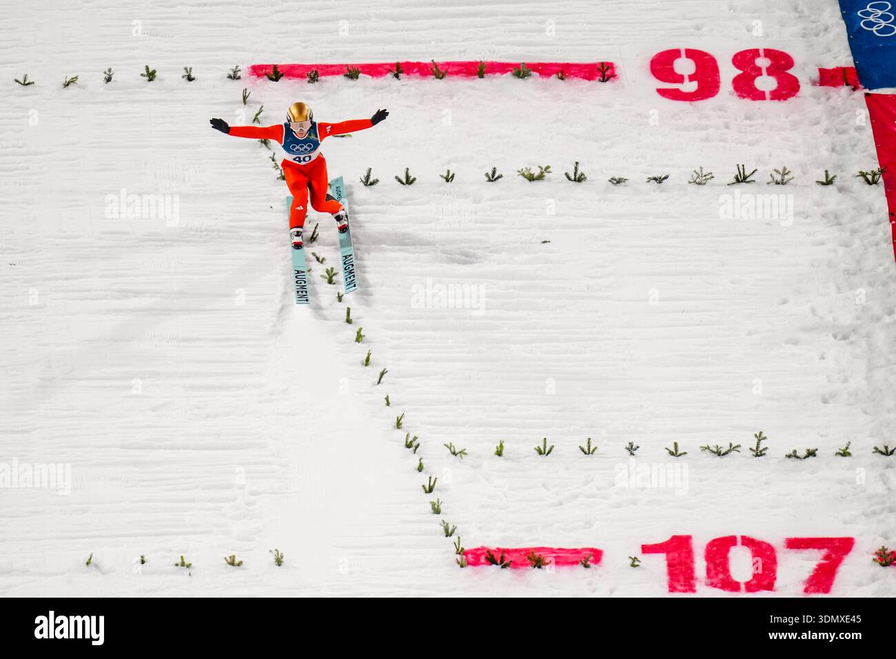 Heidi Dyhre Traaserud, of Norway, lands her trial jump of the ski ...