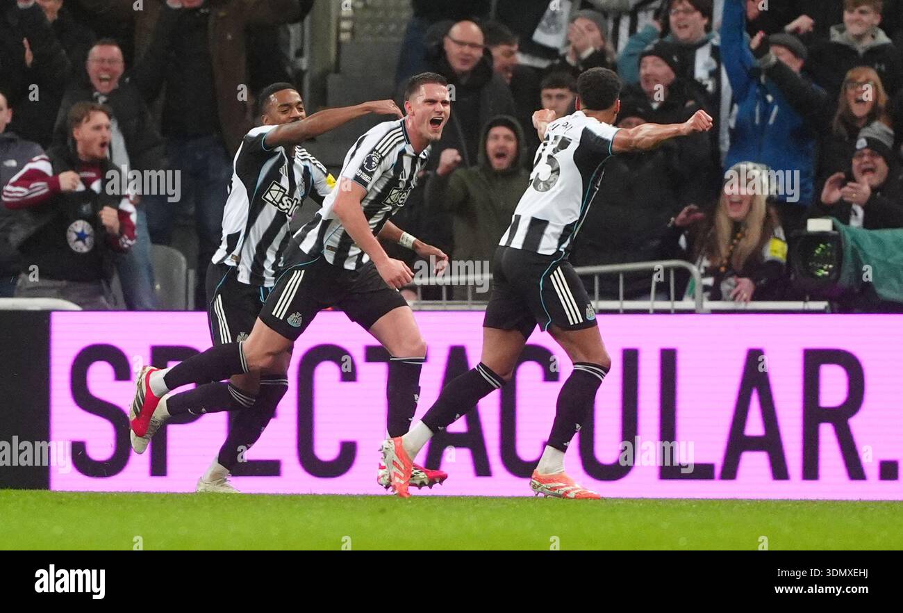 Newcastle United's Sven Botman (centre) celebrates scoring their side's ...