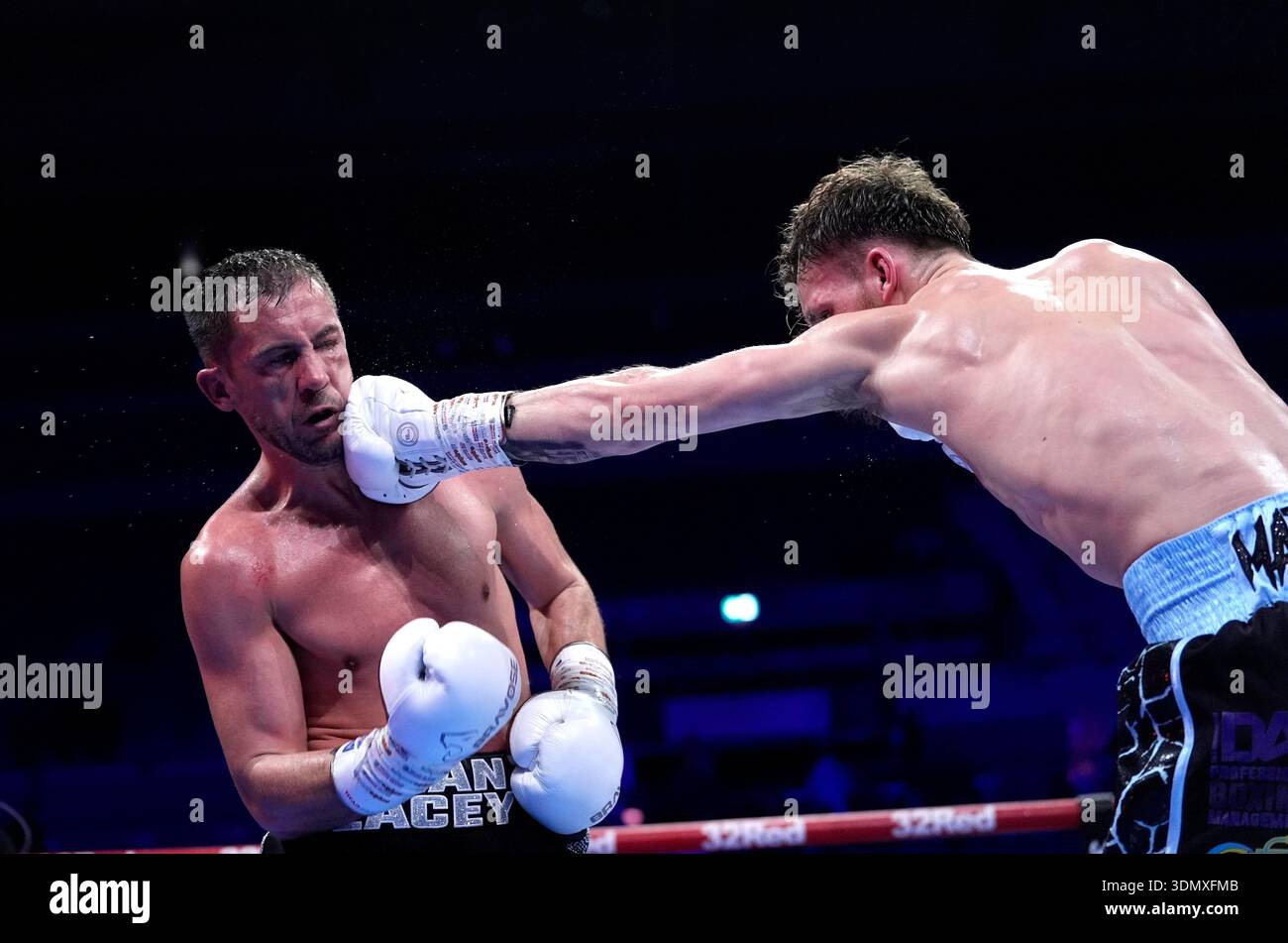 Paddy Lacey (left) and Jack Swallow in the middle weight bout at the M ...
