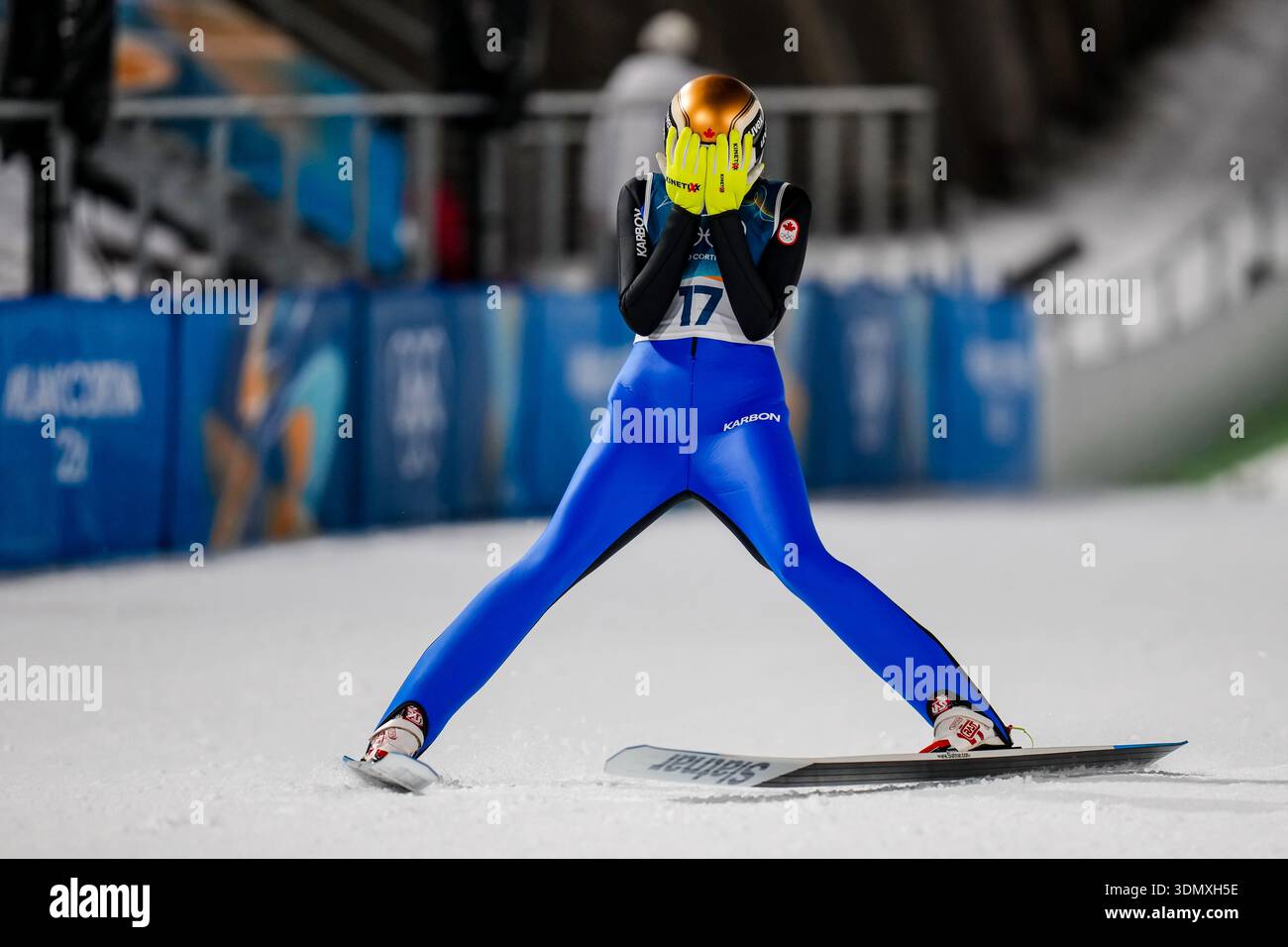 Nicole Maurer, of Canada, reacts after her first round jump during the ...