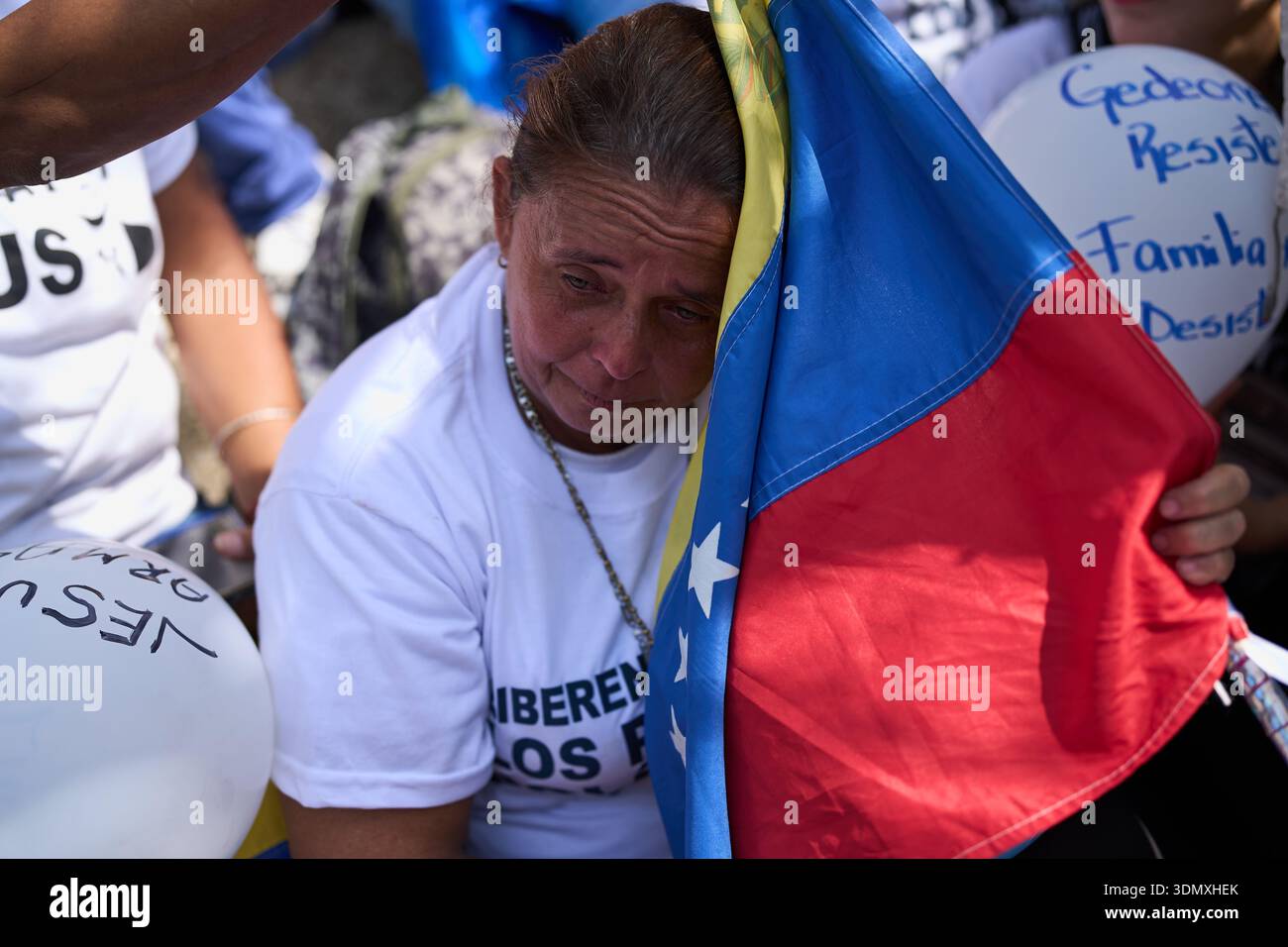 People attend a prayer for freedom of political prisoners, peace and ...