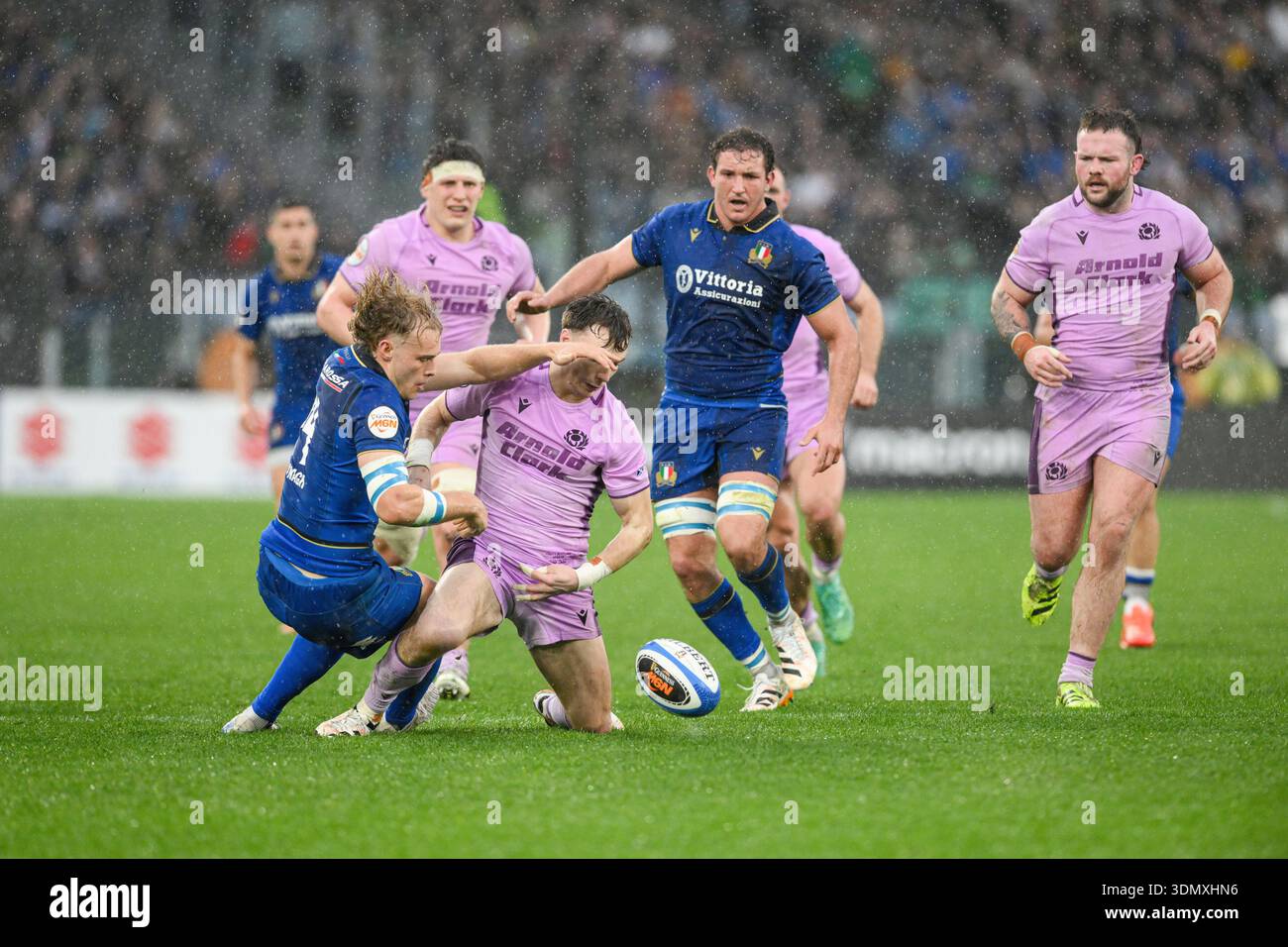 Olimpico Stadium, Rome, Italy - Tom Jordan of Scotland is tackled Juan ...