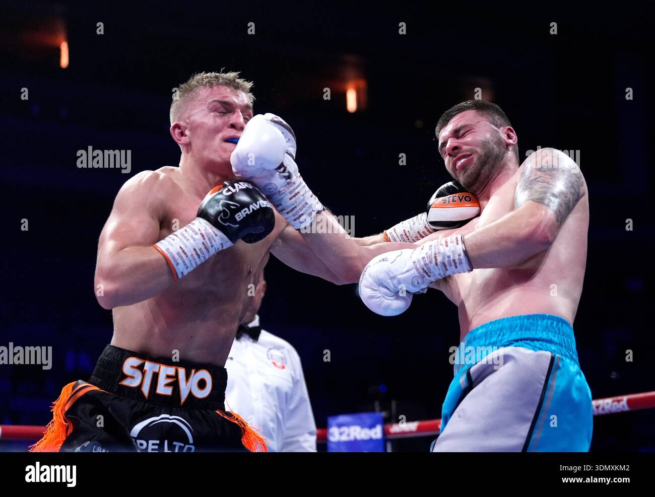 Stephen Clarke (left) and Lewis Howells in the middle weight bout at ...