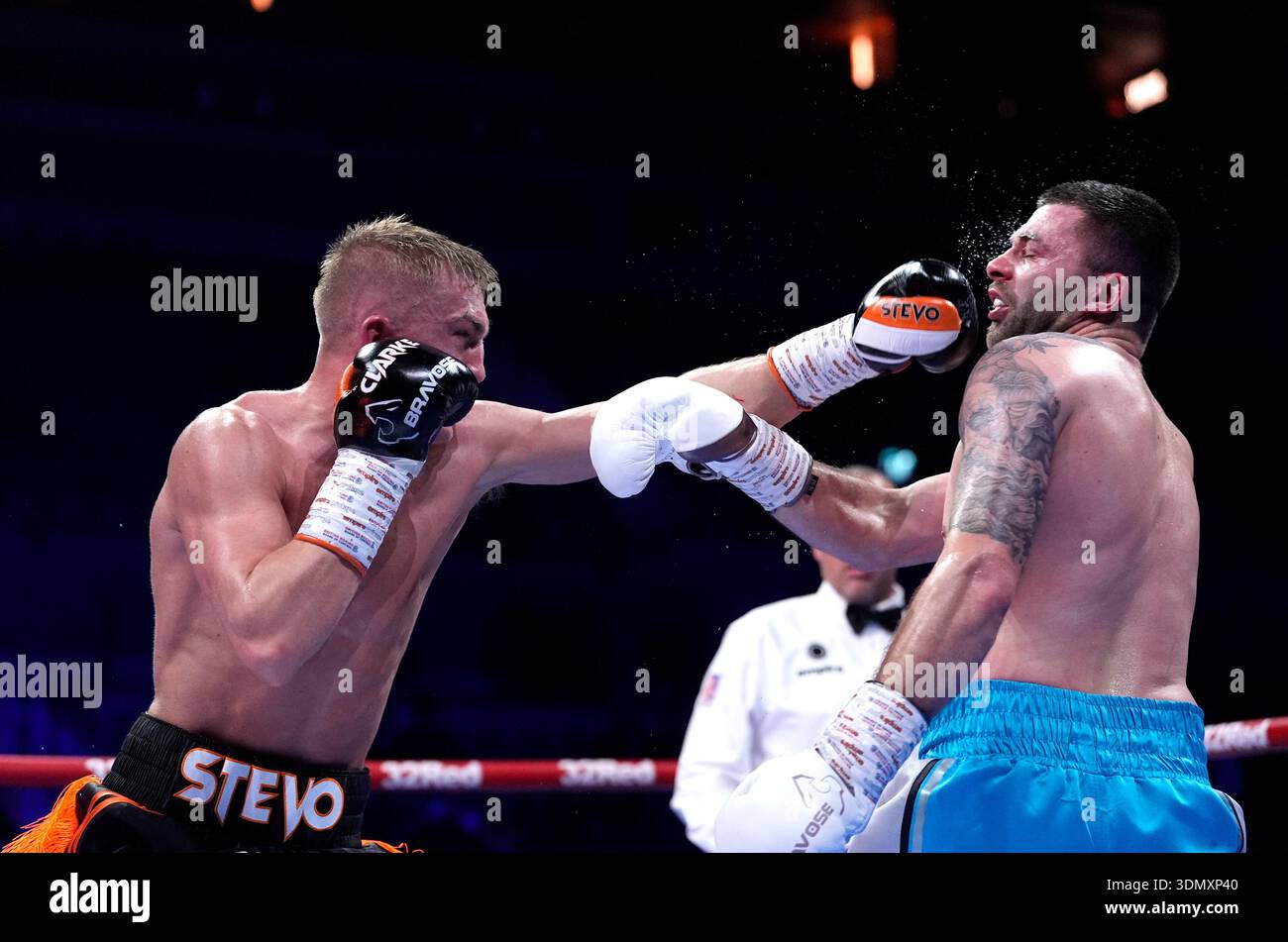 Stephen Clarke (left) and Lewis Howells in the middle weight bout at ...
