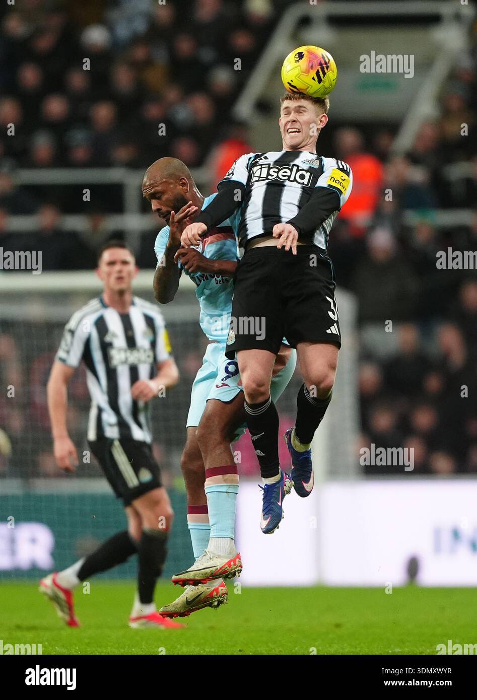 Brentford's Igor Thiago (left) and Newcastle United's Lewis Hall battle ...