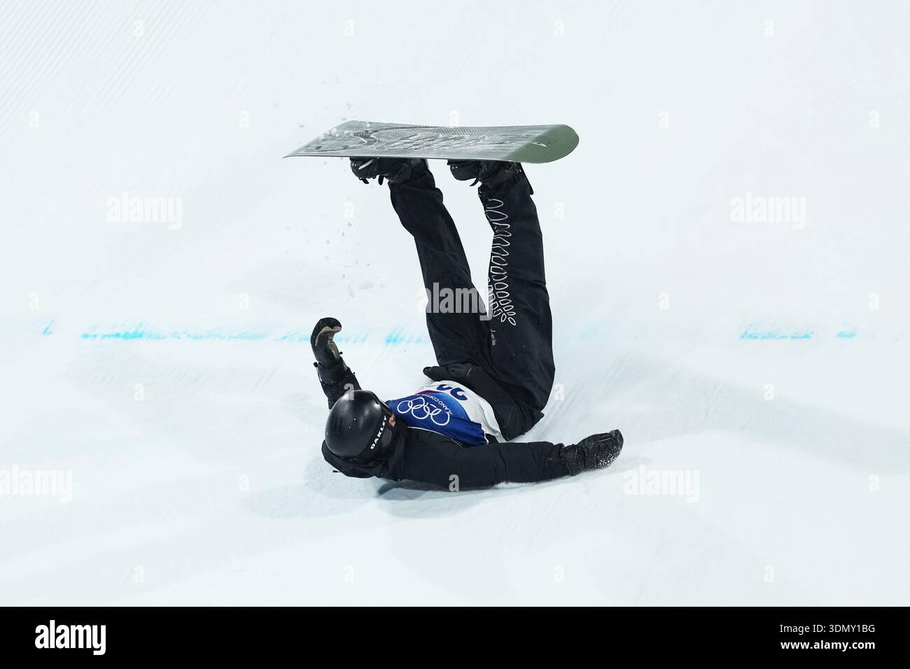 New Zealand's Lyon Farrell falls during the men's snowboarding big air ...