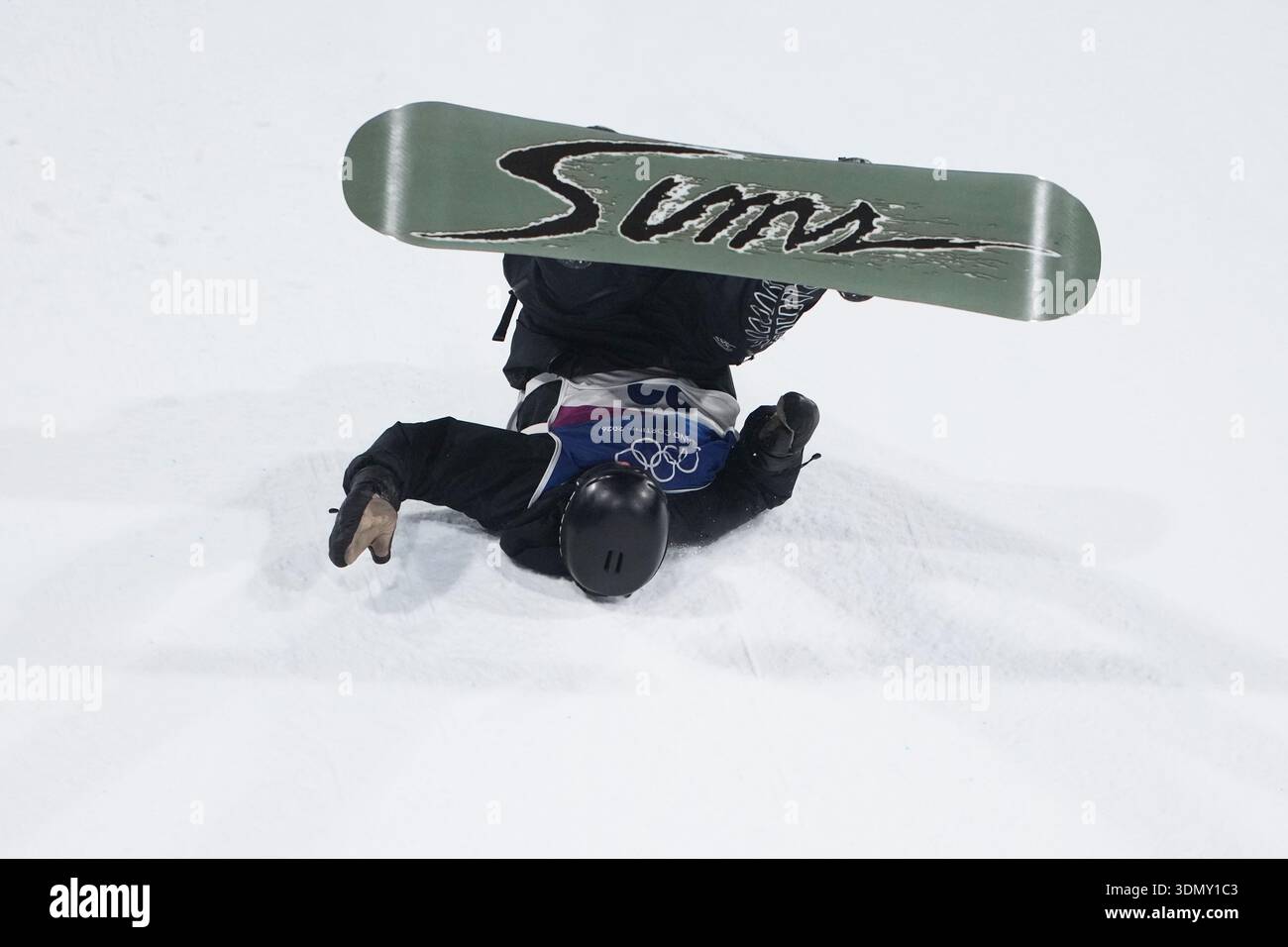 New Zealand's Lyon Farrell falls during the men's snowboarding big air ...