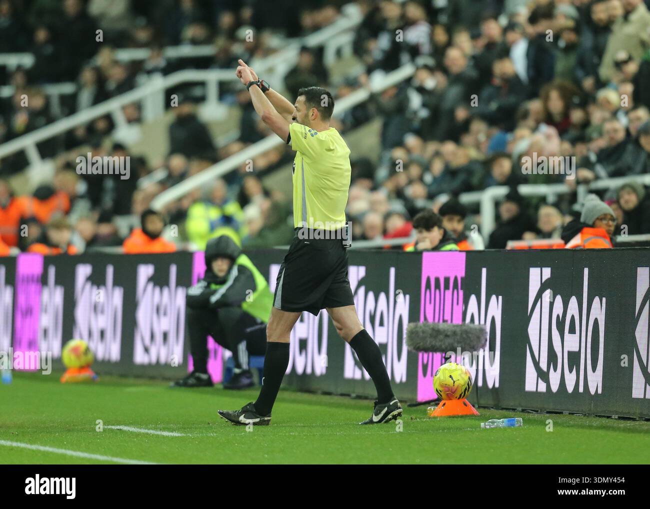 referee Andrew Madley checks the VAR screen during the Premier League ...