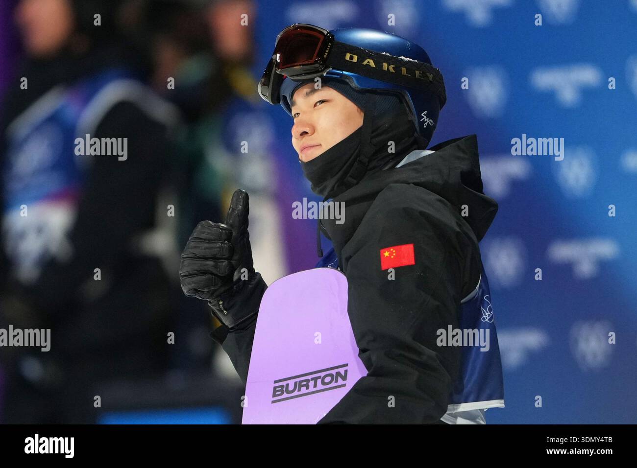 China's Su Yiming reacts during the men's snowboarding big air finals ...