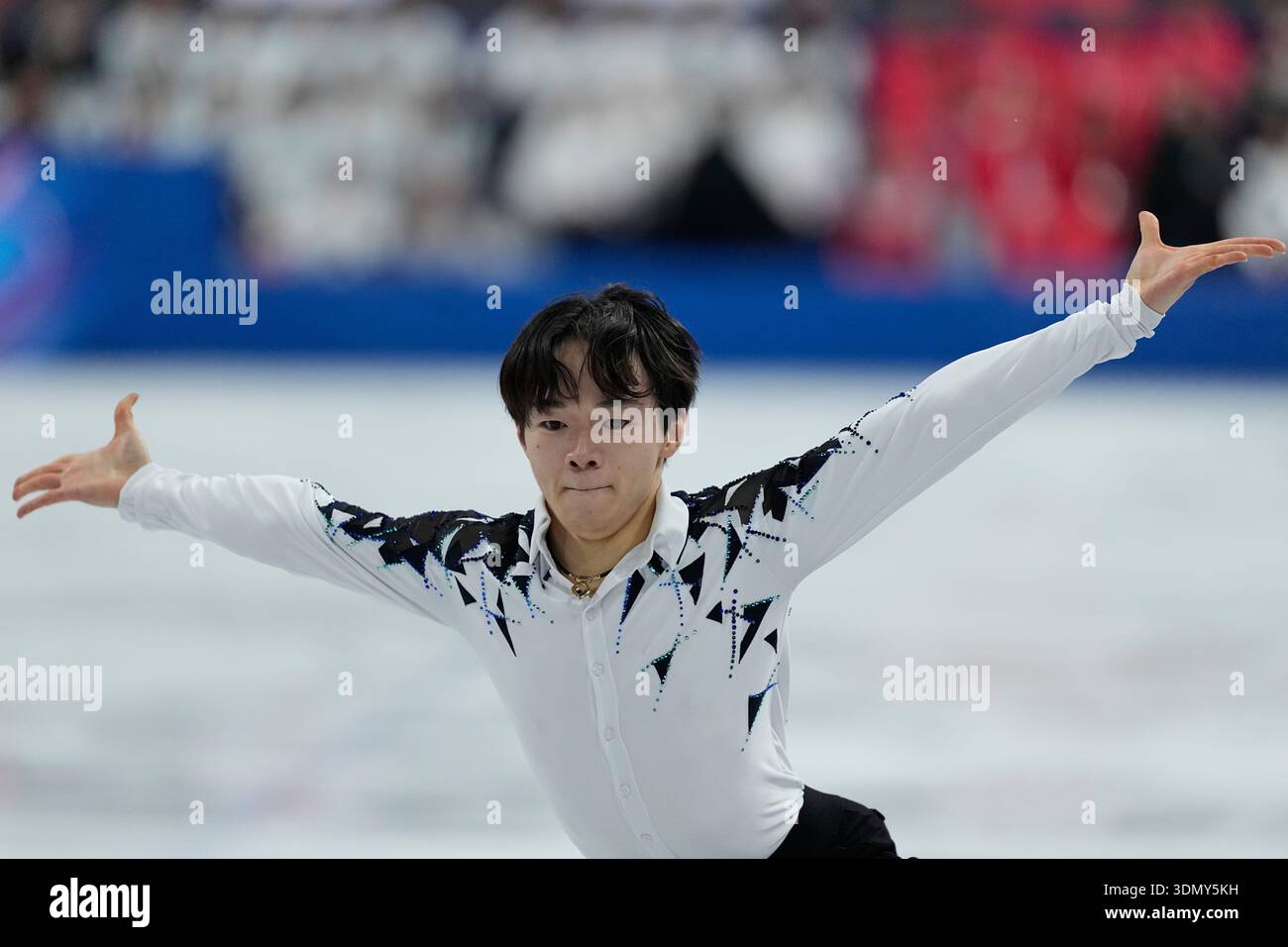 Yuma Kagiyama of Japan competes during the figure skating men's team ...