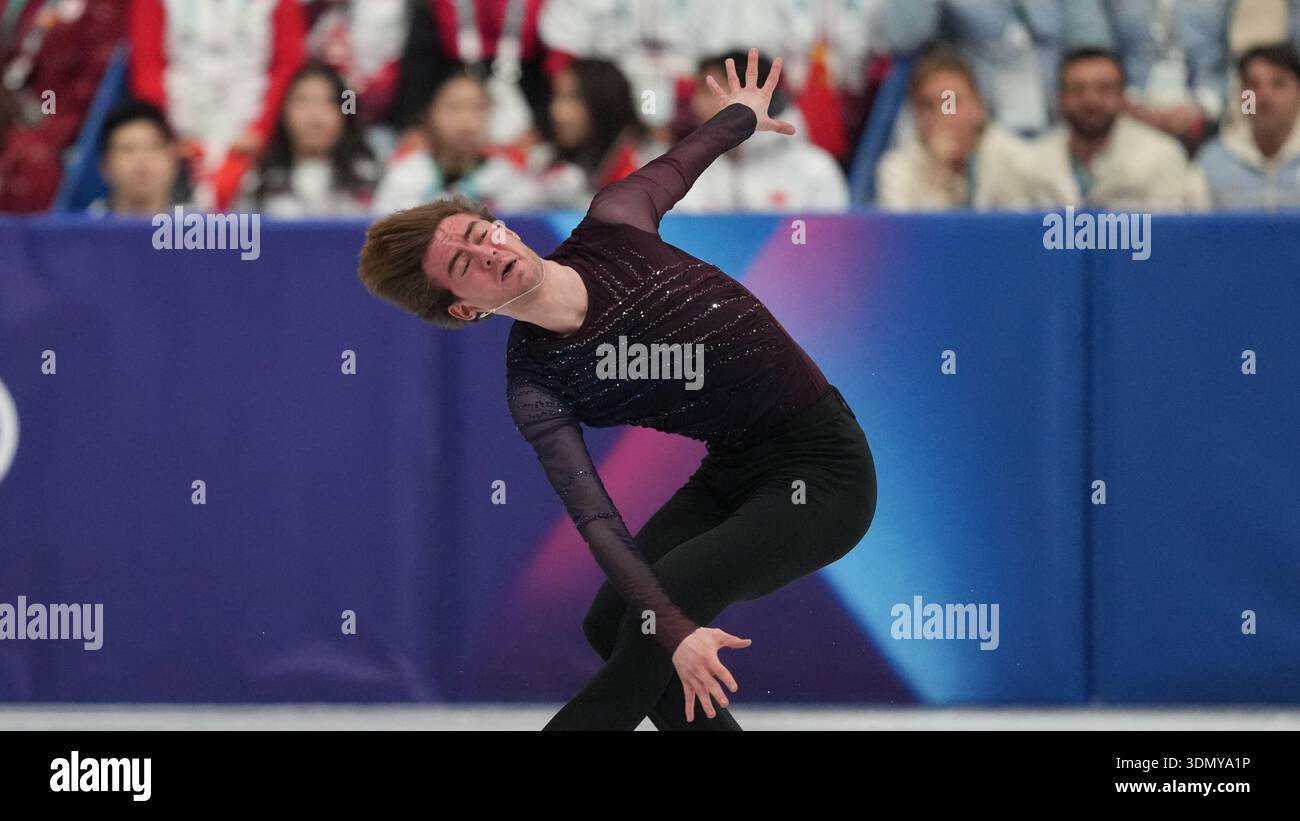 Edward Appleby of Britain competes during the figure skating men's team ...