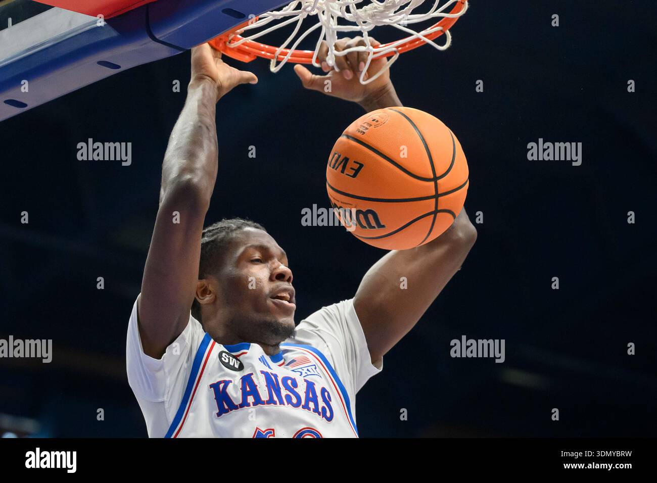 Kansas forward Flory Bidunga dunks against Utah during the first half ...