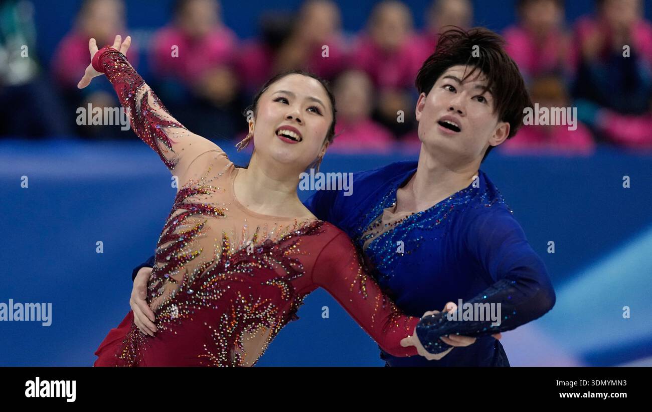 Utana Yoshida and Masaya Morita of Japan compete during the figure ...