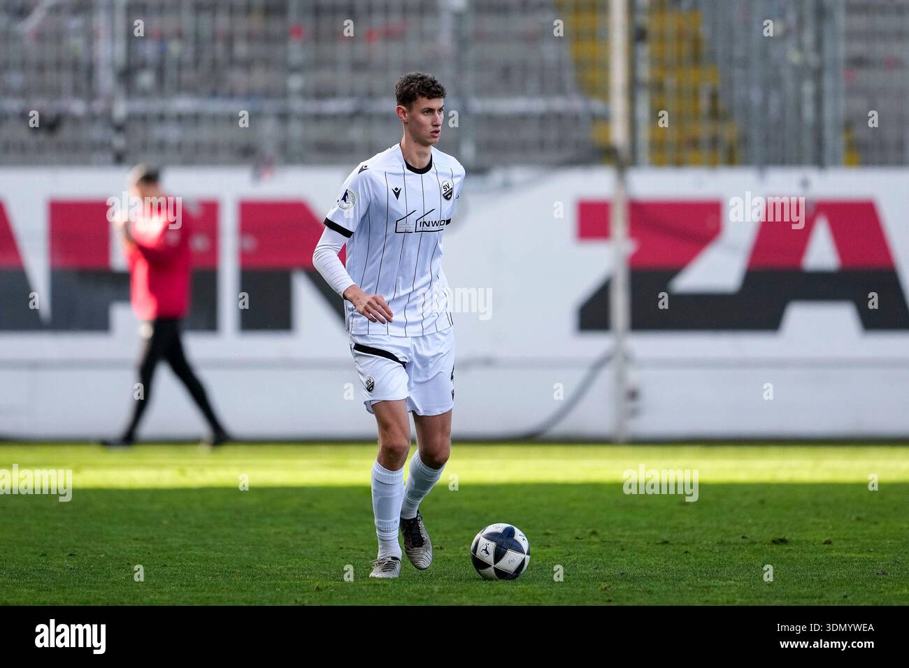 Benedikt Wimmer (SVS. 4), on the ball, cutout, full body, single image ...