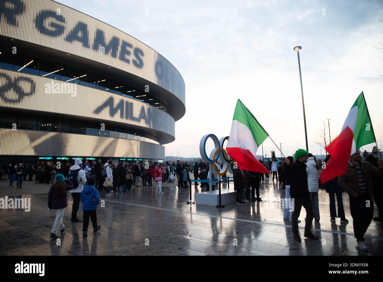 MILAN, FEBRUARY 5th 2026 - People with italian flags outside Arena ...