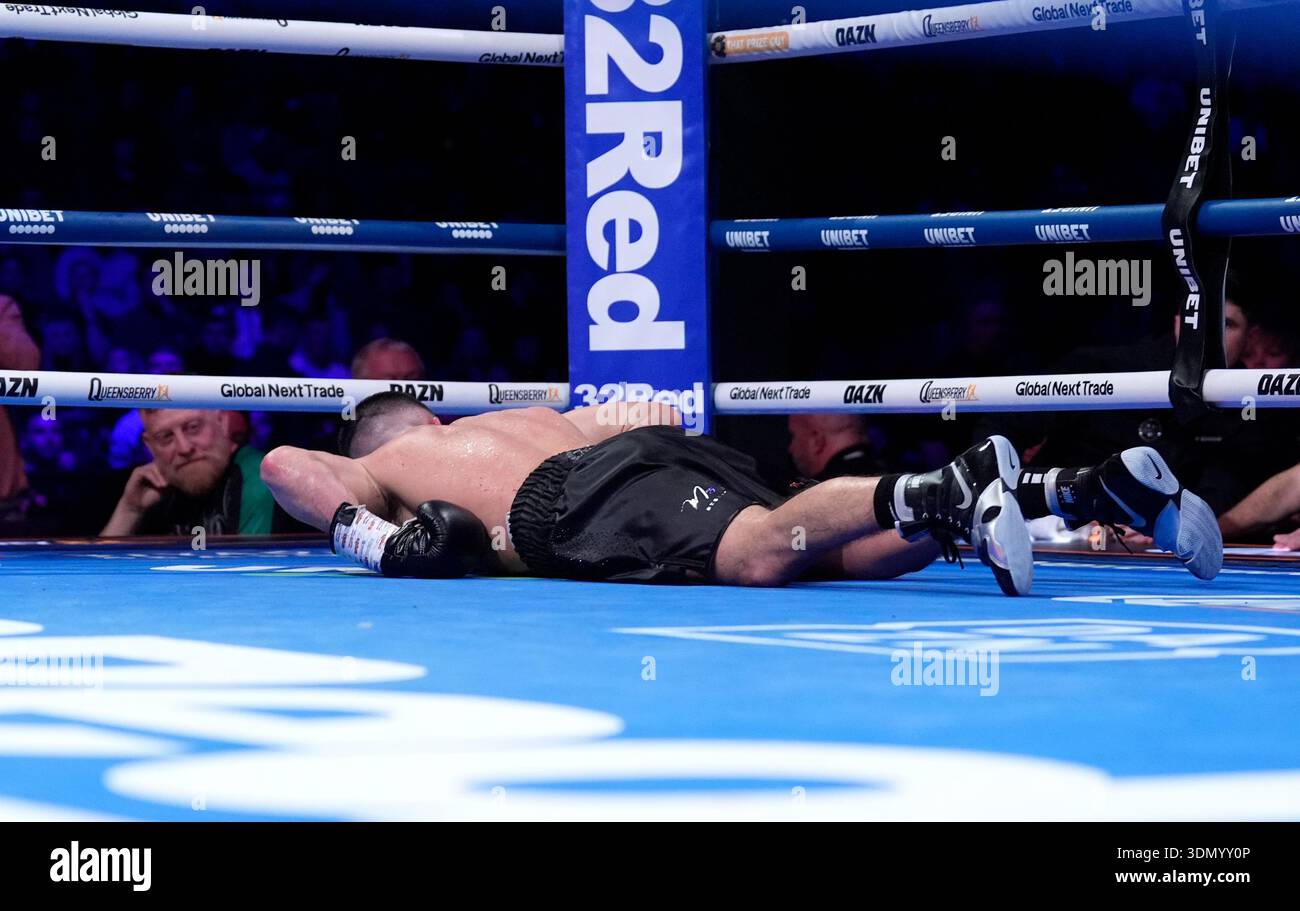 Nick Ball reacts after being knocked out in the feather weight bout at ...