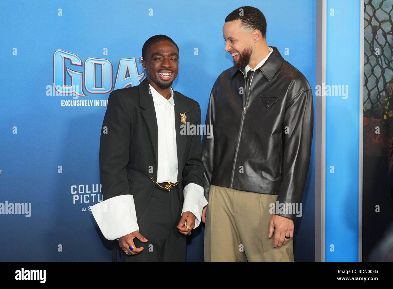 Caleb McLaughlin, left, and Stephen Curry arrive at the premiere of ...