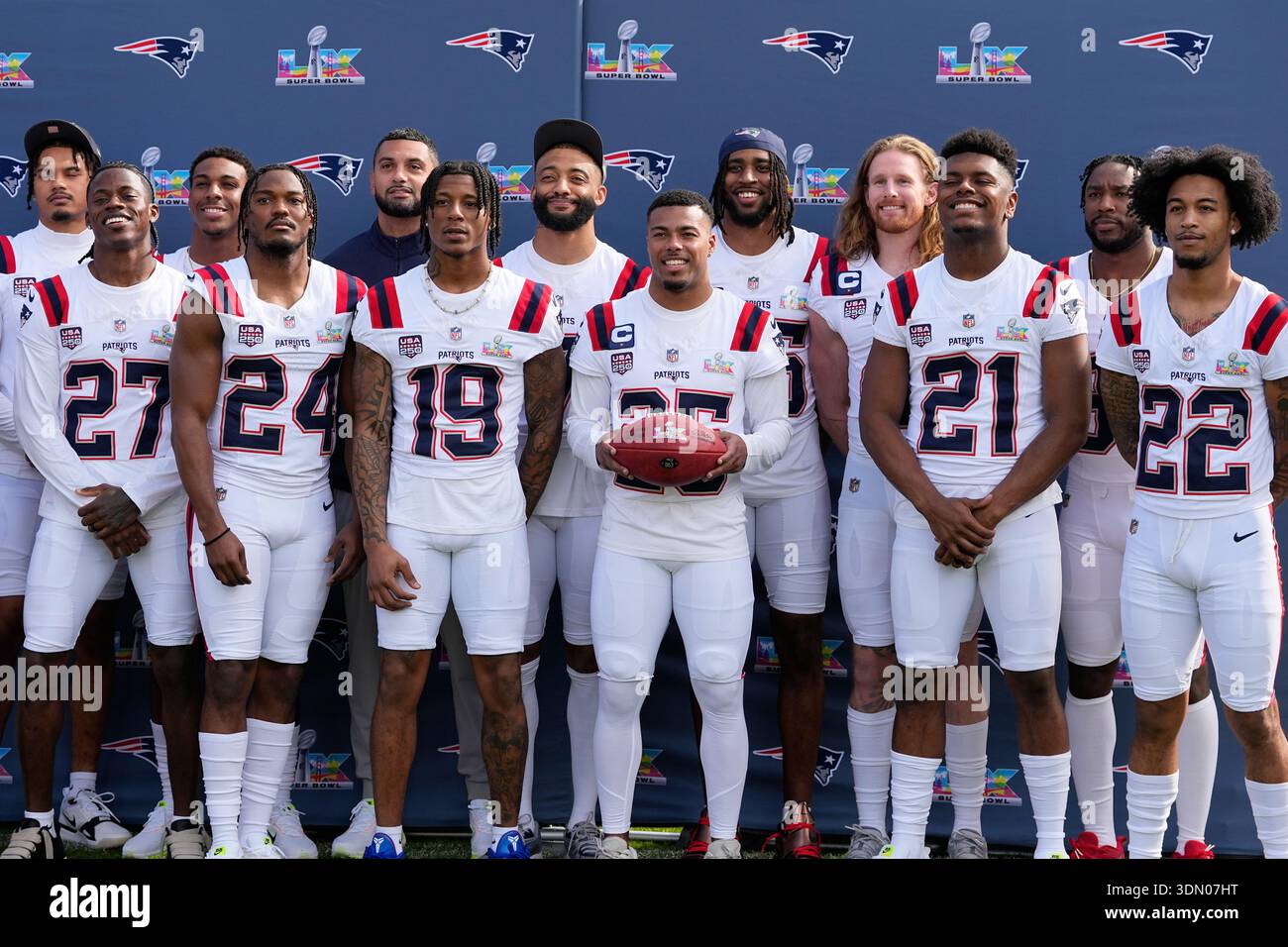 New England Patriots team members pose for a photo at the practice ...