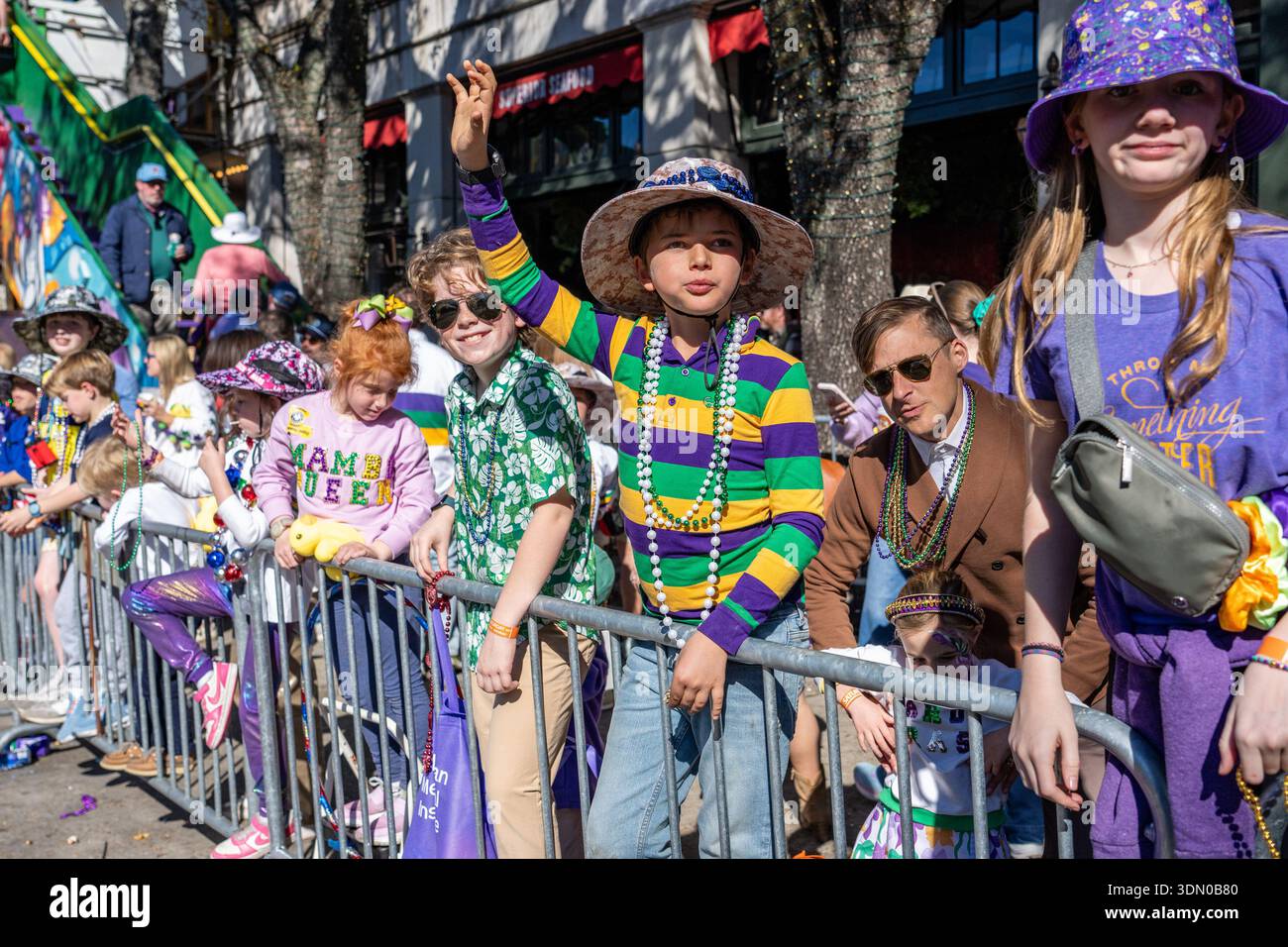 Attendees take part in the annual Legion of Mars parade during the ...
