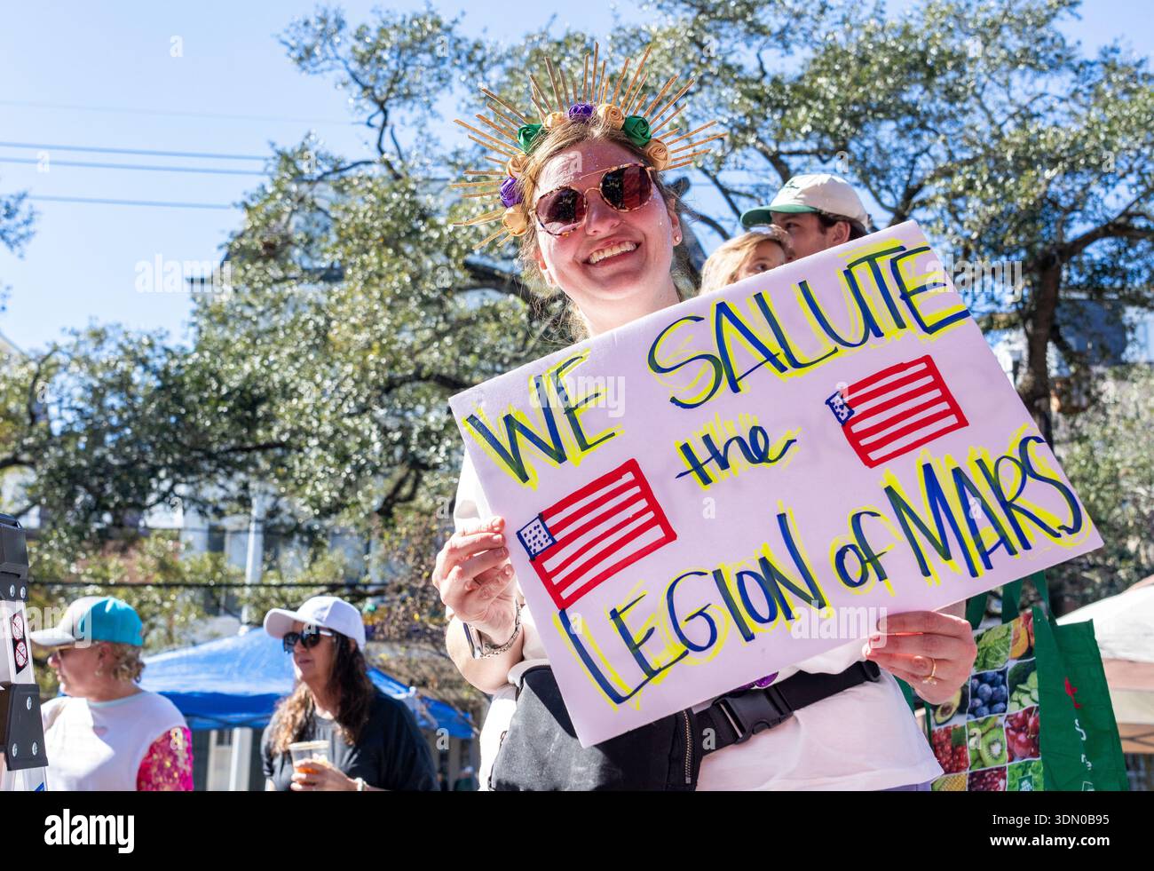 Attendees take part in the annual Legion of Mars parade during the ...