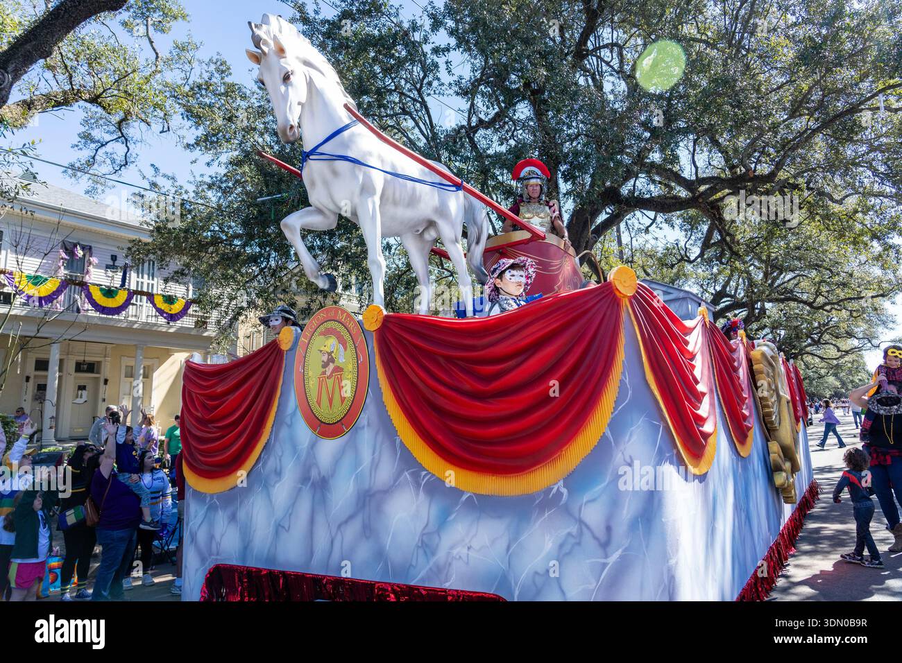 Attendees take part in the annual Legion of Mars parade during the ...