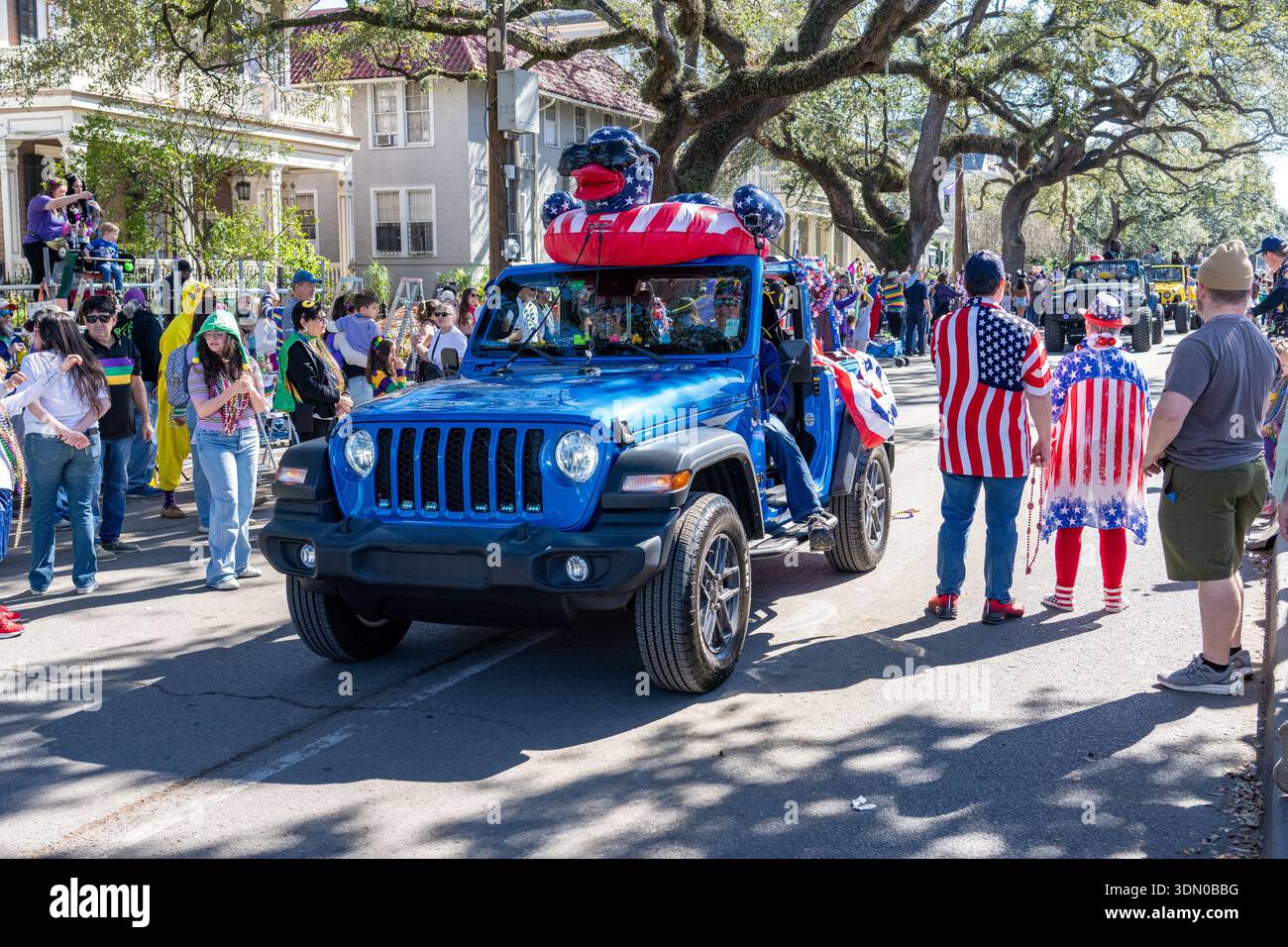Attendees take part in the annual Legion of Mars parade during the ...