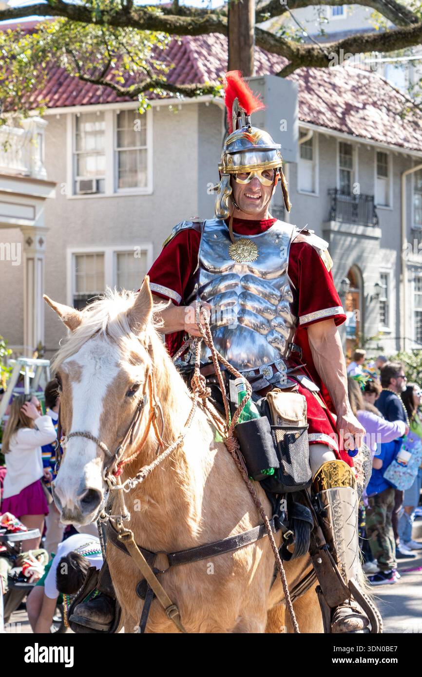 Attendees take part in the annual Legion of Mars parade during the ...