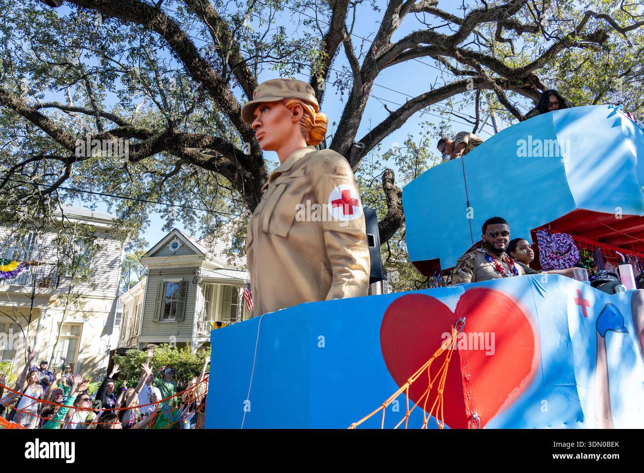 Attendees take part in the annual Legion of Mars parade during the ...