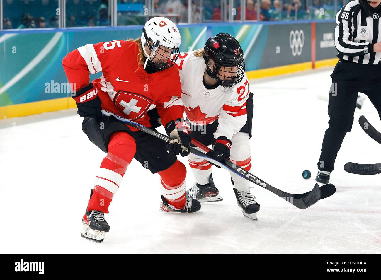 Canada's Emma Maltais (27) battles Switzerland's Laure Meriguet (15 ...