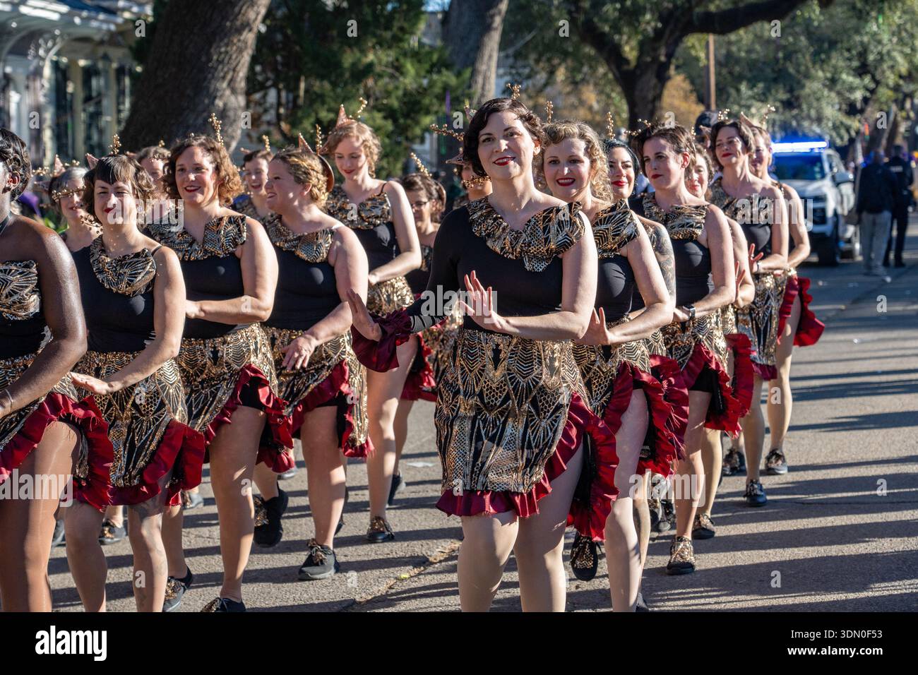 Attendees march during the annual Krewe of Freret parade during the ...