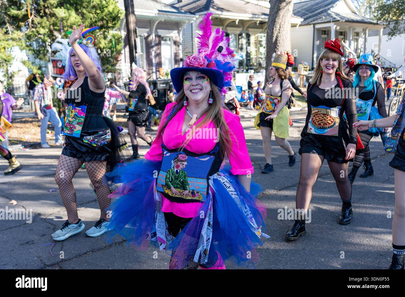 Attendees march during the annual Krewe of Freret parade during the ...