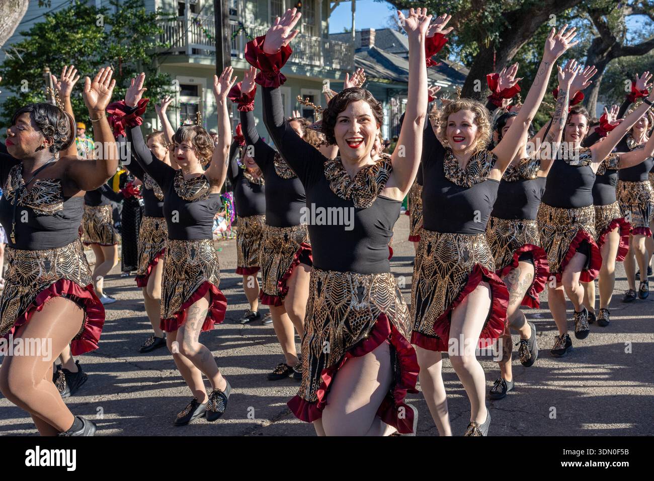Attendees march during the annual Krewe of Freret parade during the ...