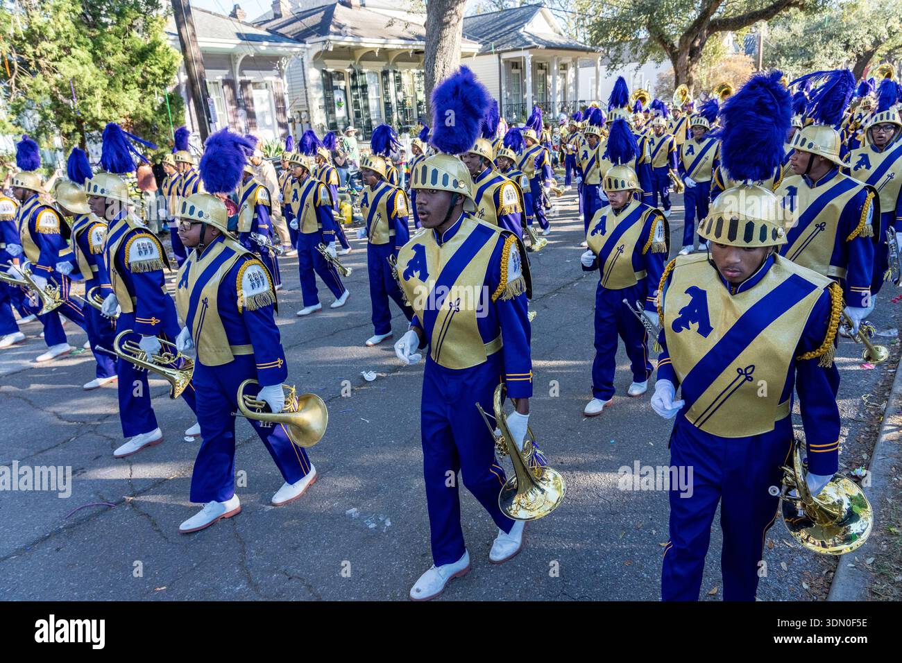 Attendees march during the annual Krewe of Freret parade during the ...