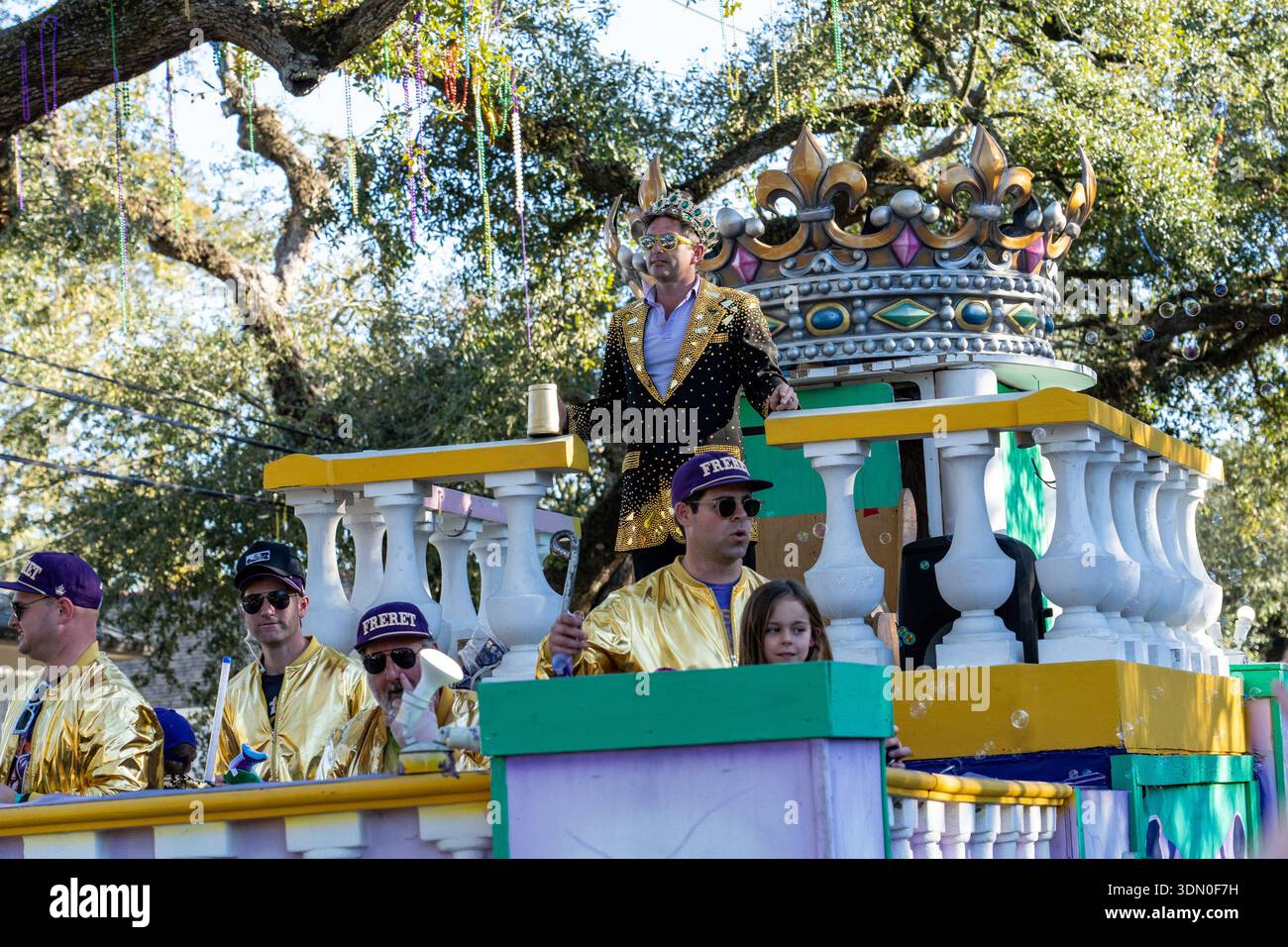 Attendees march during the annual Krewe of Freret parade during the ...