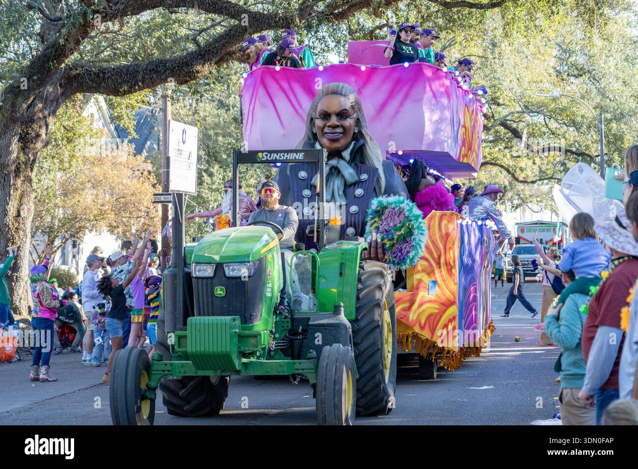 Attendees march during the annual Krewe of Freret parade during the ...