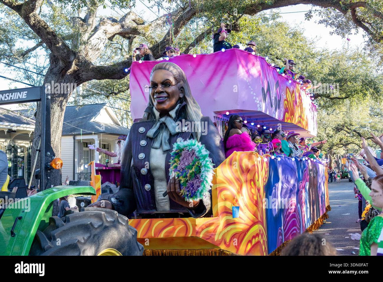 Attendees march during the annual Krewe of Freret parade during the ...