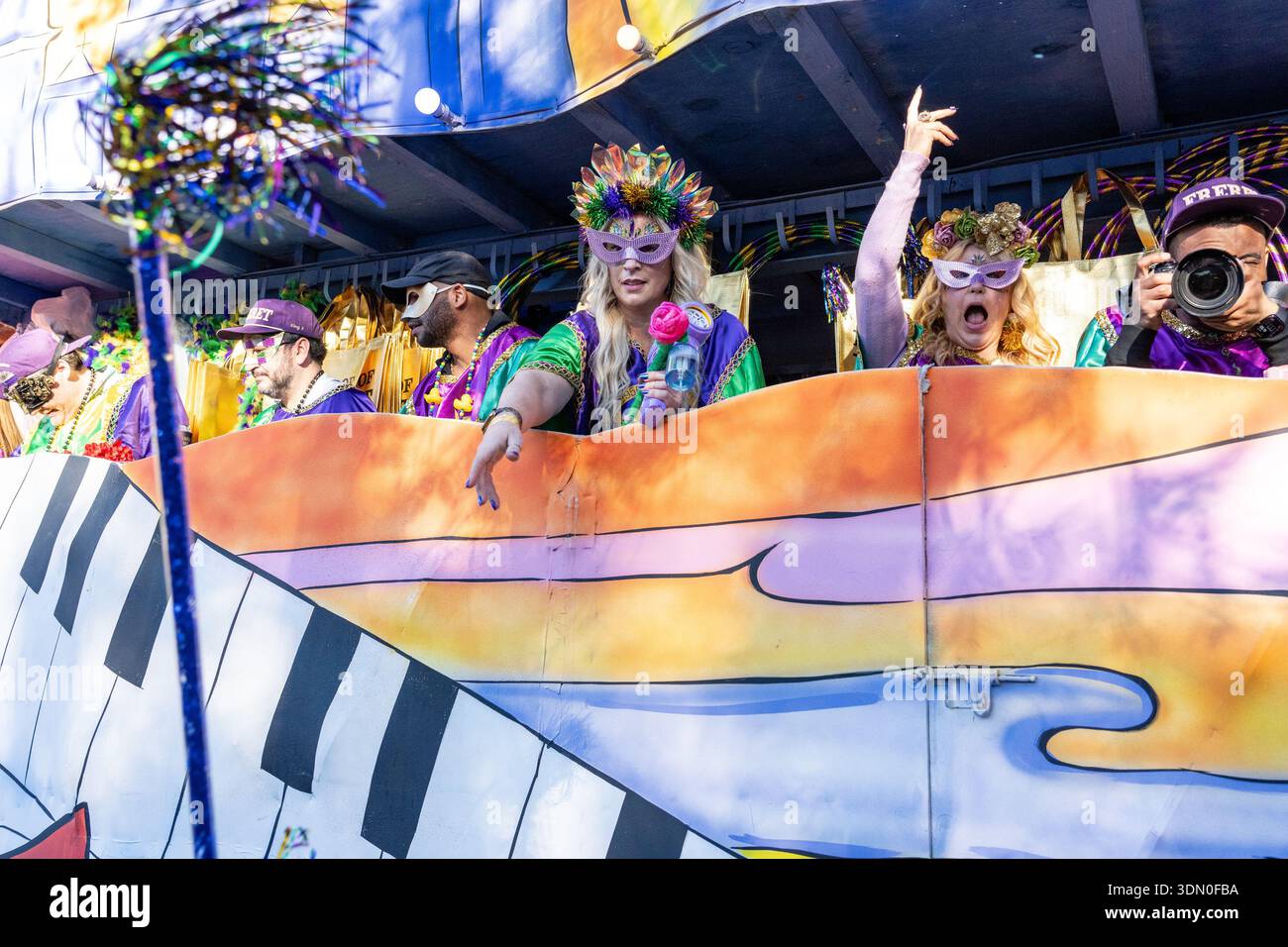 Attendees march during the annual Krewe of Freret parade during the ...