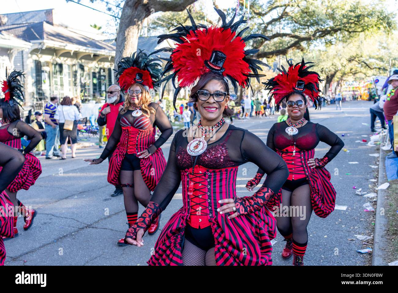 Attendees march during the annual Krewe of Freret parade during the ...