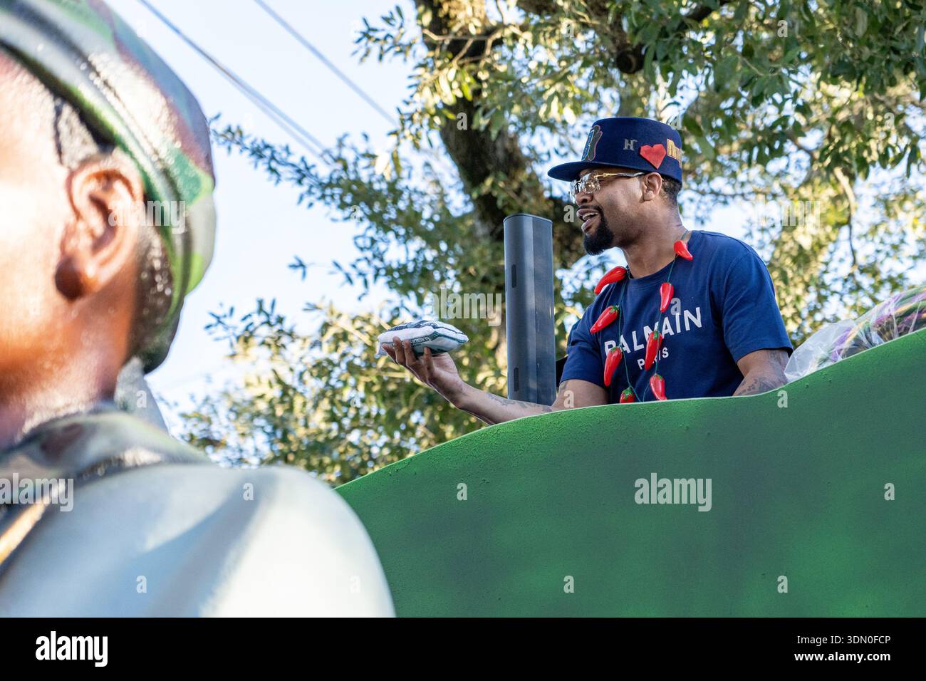 Attendees march during the annual Krewe of Freret parade during the ...