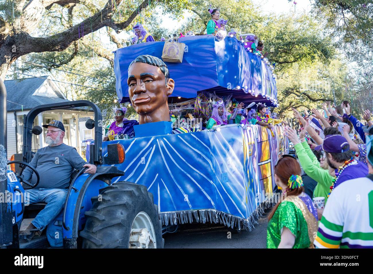 Attendees march during the annual Krewe of Freret parade during the ...