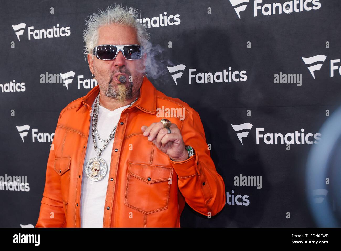 Guy Fieri walking on the red carpet at Michael Rubin’s Fanatics Super ...